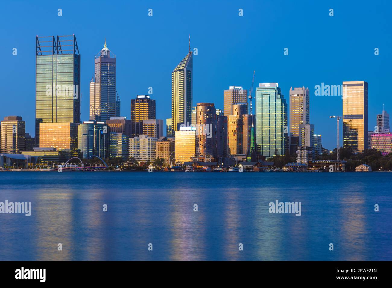 skyline of perth at night by swan river in western australia, australia ...