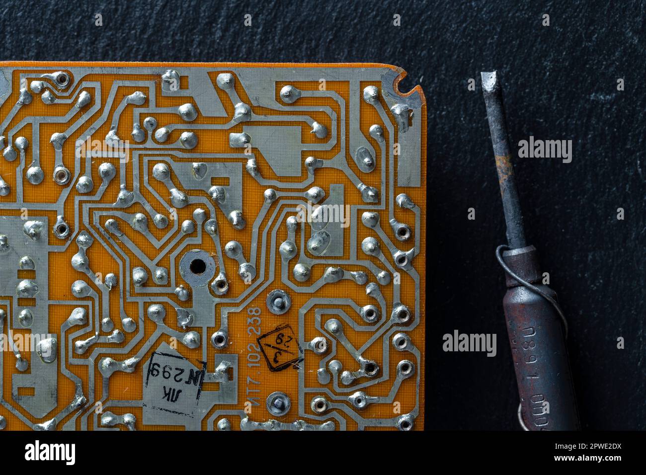 Old printed circuit board background. Vintage circuit board with ...