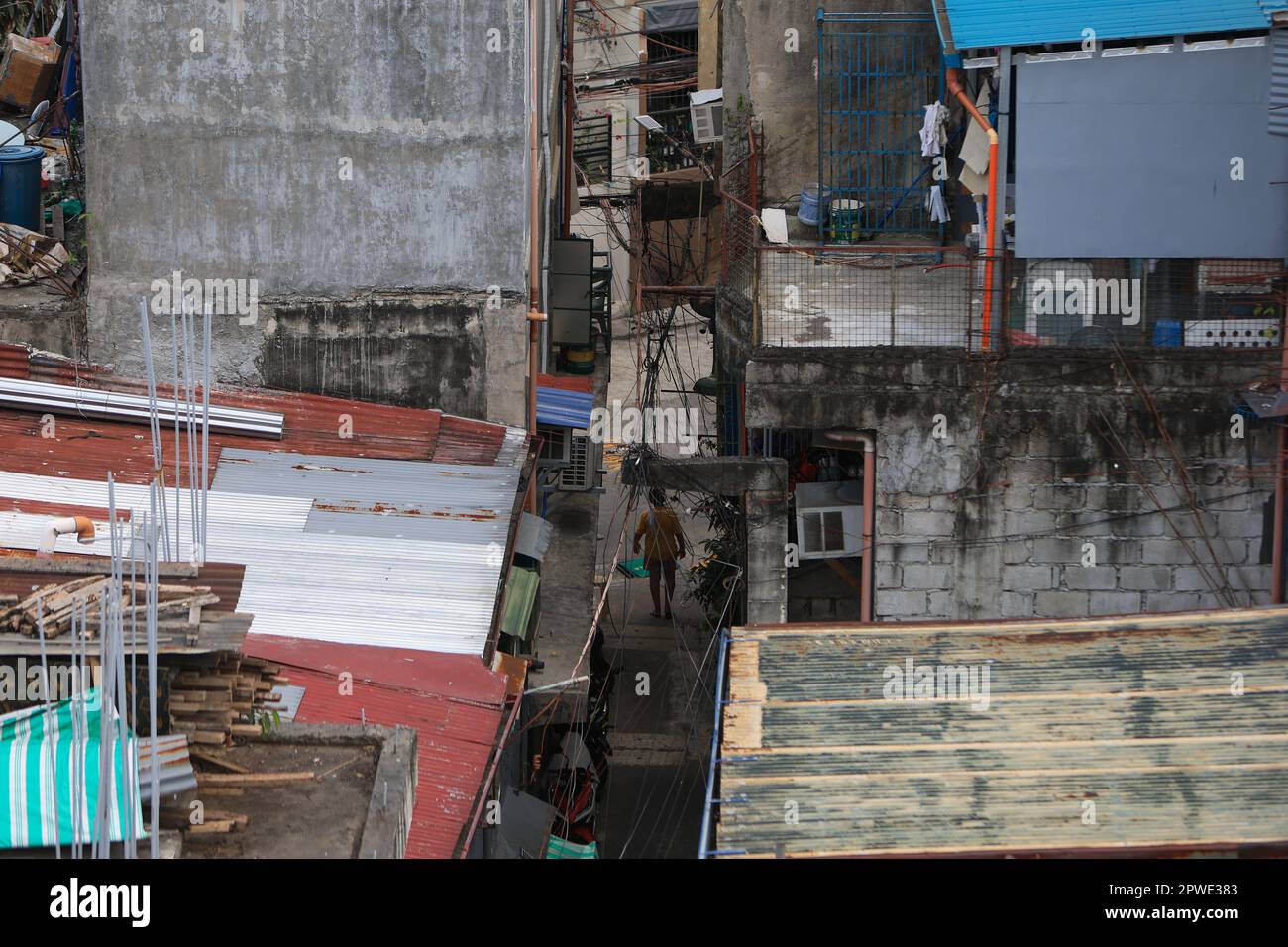 Metro Manila, Manila, The Philippines. 30th Apr, 2023. A woman walks on ...