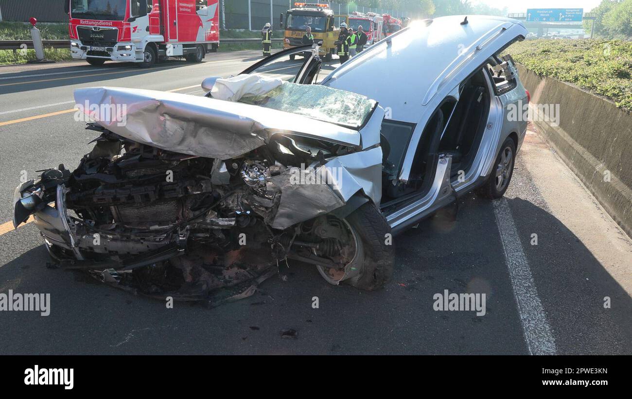 Cologne, Germany. 30th Apr, 2023. A car completely destroyed in an accident stands on the A3 ...