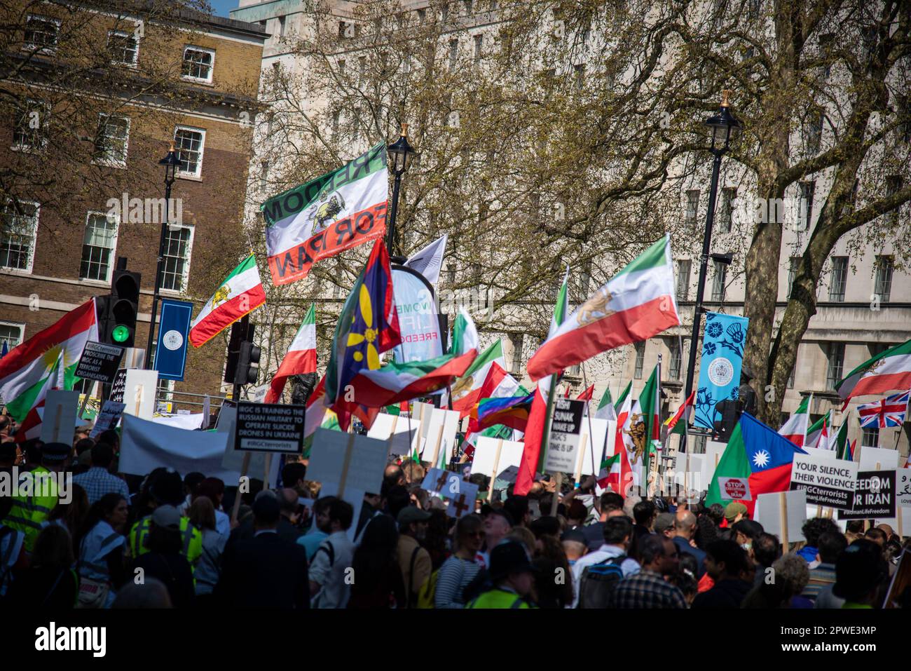 London, UK. 29th Apr, 2023. Protestors hold Iranian flags during a ...