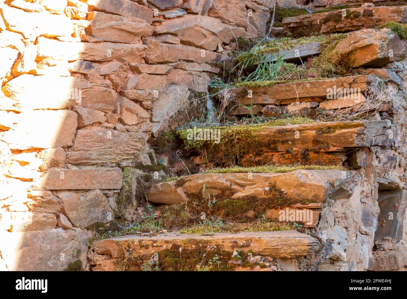Stairs in a patio of a house built with clay stone, typical of La ...