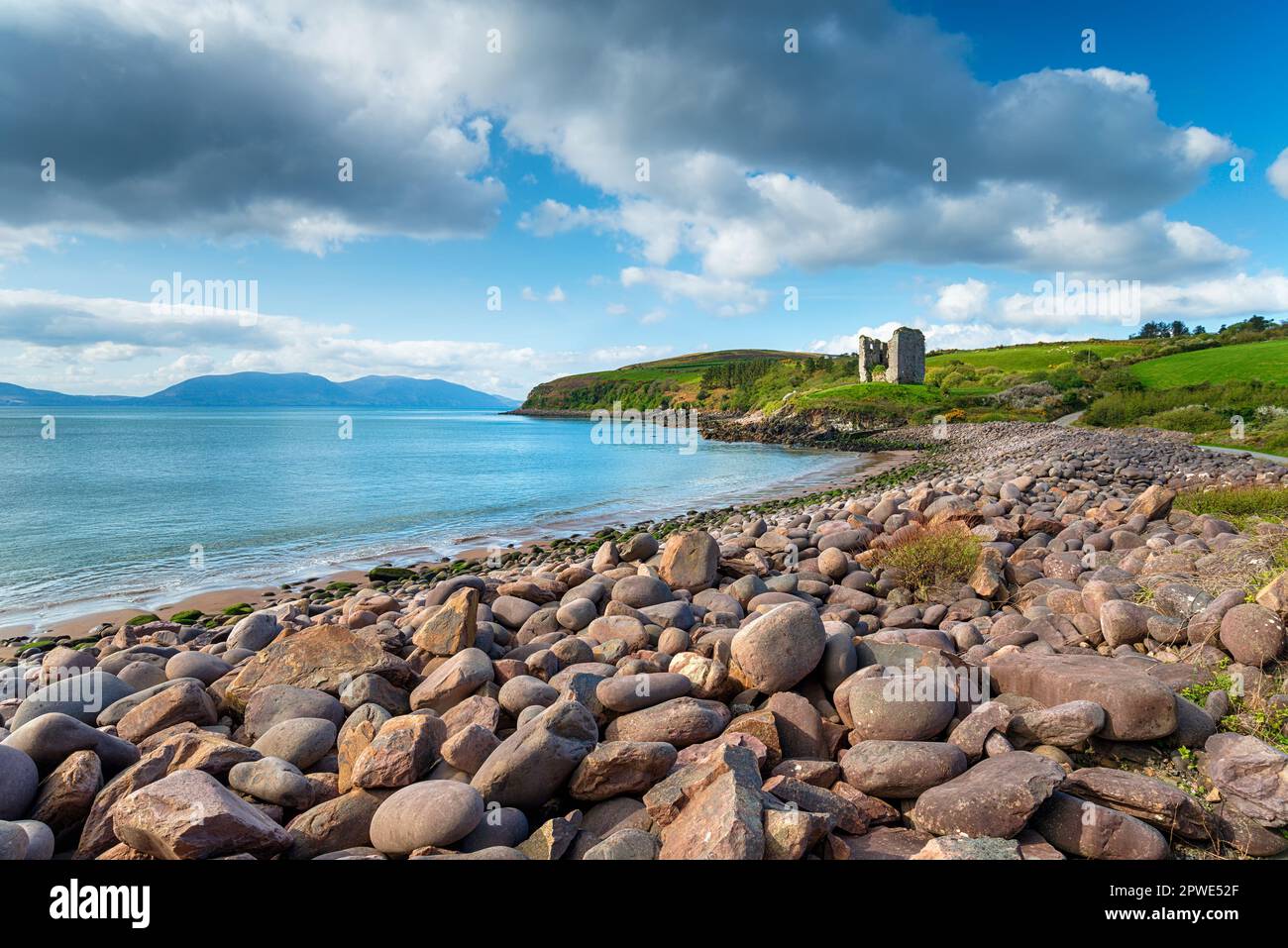 The ancient ruins of Minard Castle overlooking Kilmurry Bay on the ...