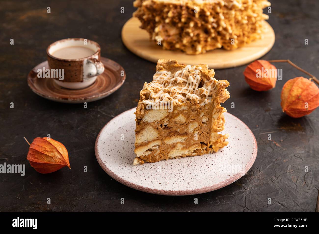 Traditional lithuanian cake shakotis with cup of coffee on black ...