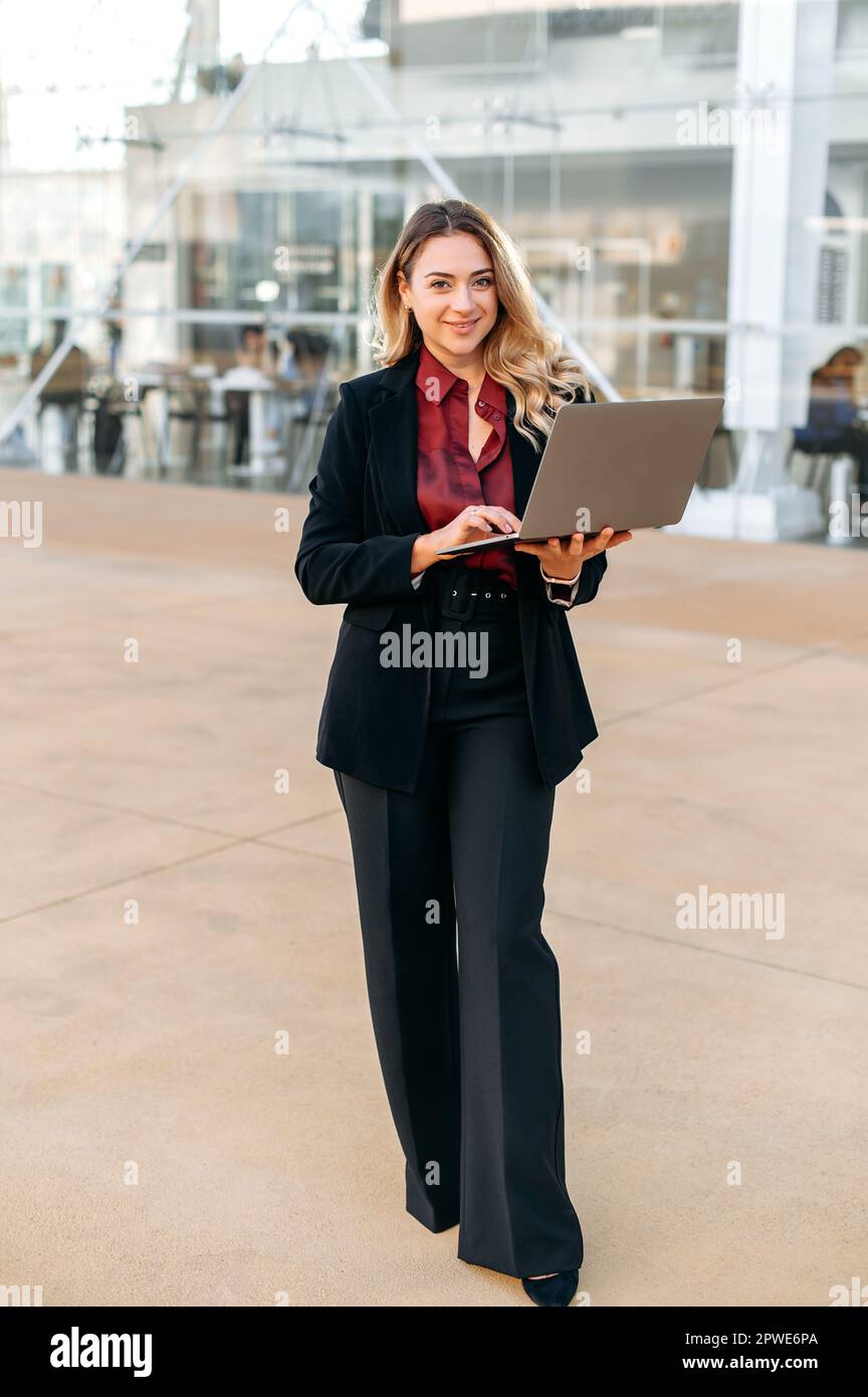 Full-length vertical photo of gorgeous successful confident elegant ...