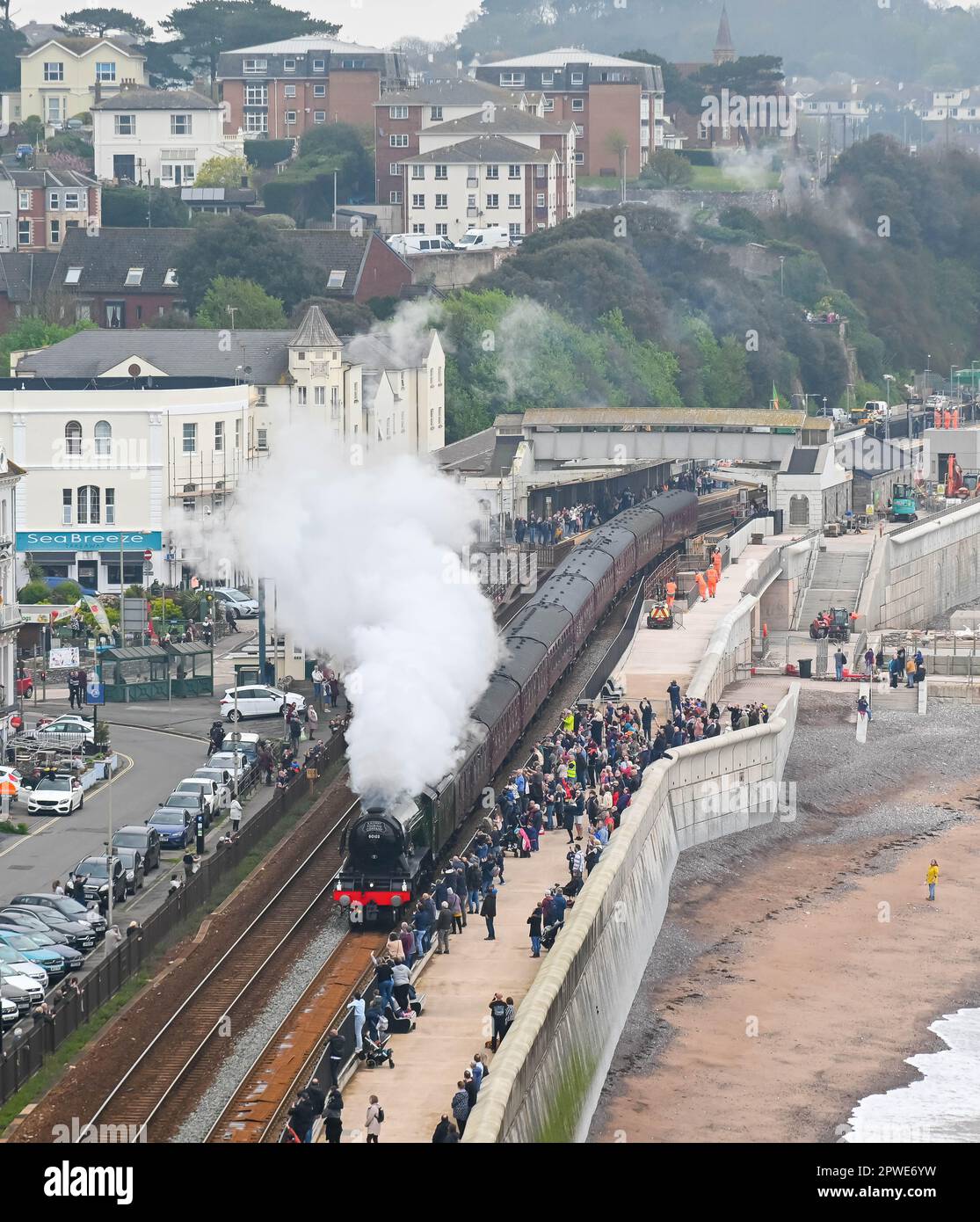 Dawlish, Devon, UK. 30th April 2023. Steam enthusiasts line the sea ...