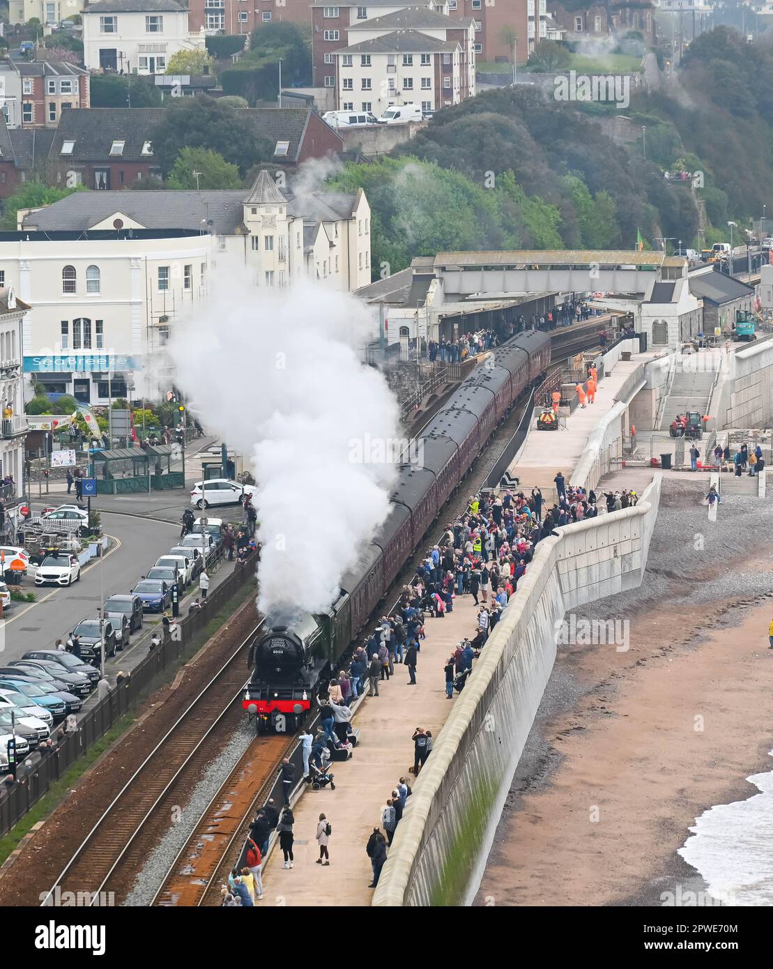 Dawlish, Devon, UK. 30th April 2023. Steam enthusiasts line the sea ...
