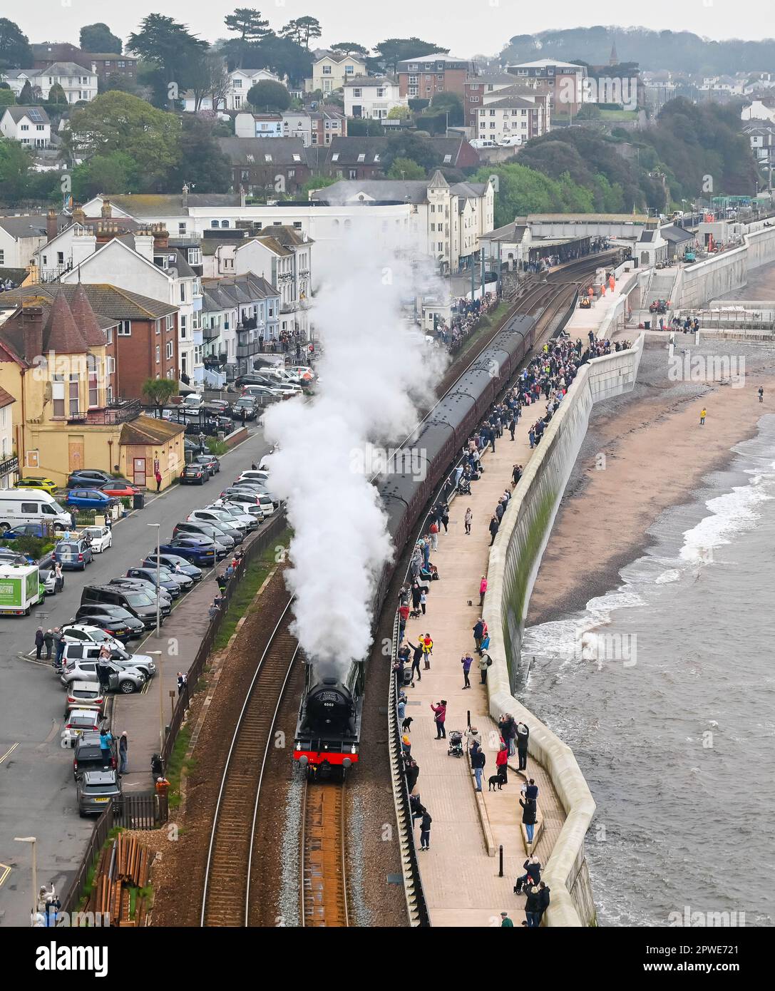 Dawlish, Devon, UK. 30th April 2023. Steam enthusiasts line the sea ...