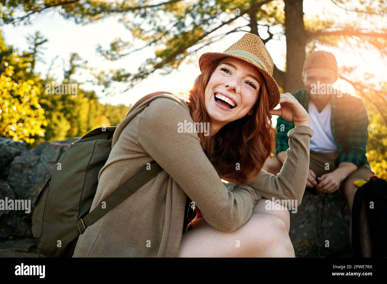 Having fun in a foreign place. two young people hiking while on an ...