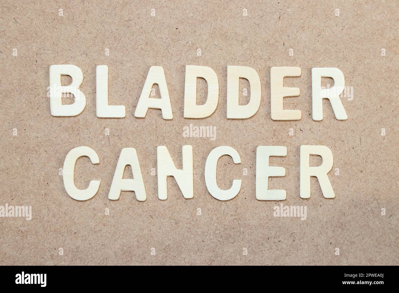 Wood alphabet letter in word bladder cancer on wood background Stock ...