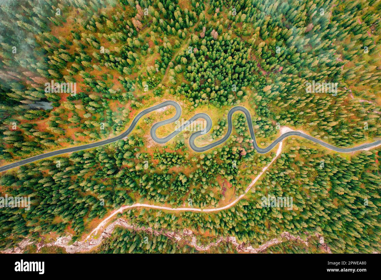 Aerial view of the renowned Snake Road winding through the vibrant ...