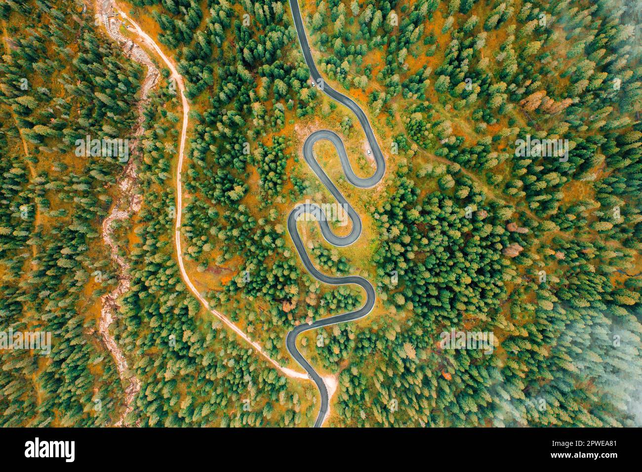 World renowned Snake Road with the vibrant and colorful landscape of ...