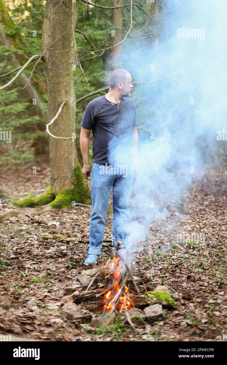Man hands trying fire hi-res stock photography and images - Alamy