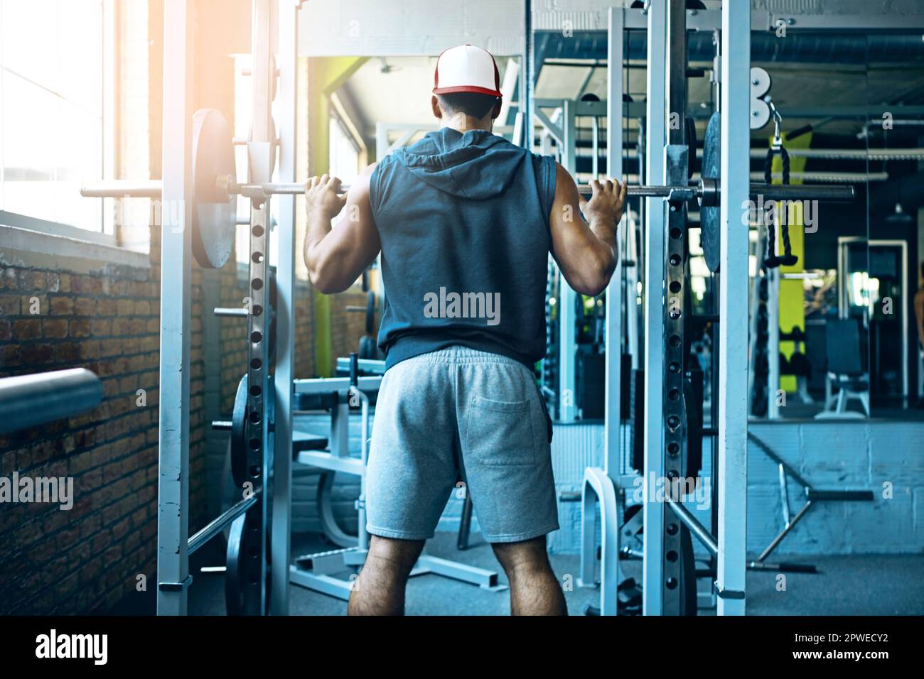 Nothing is over until you stop trying. a man doing weight training at ...