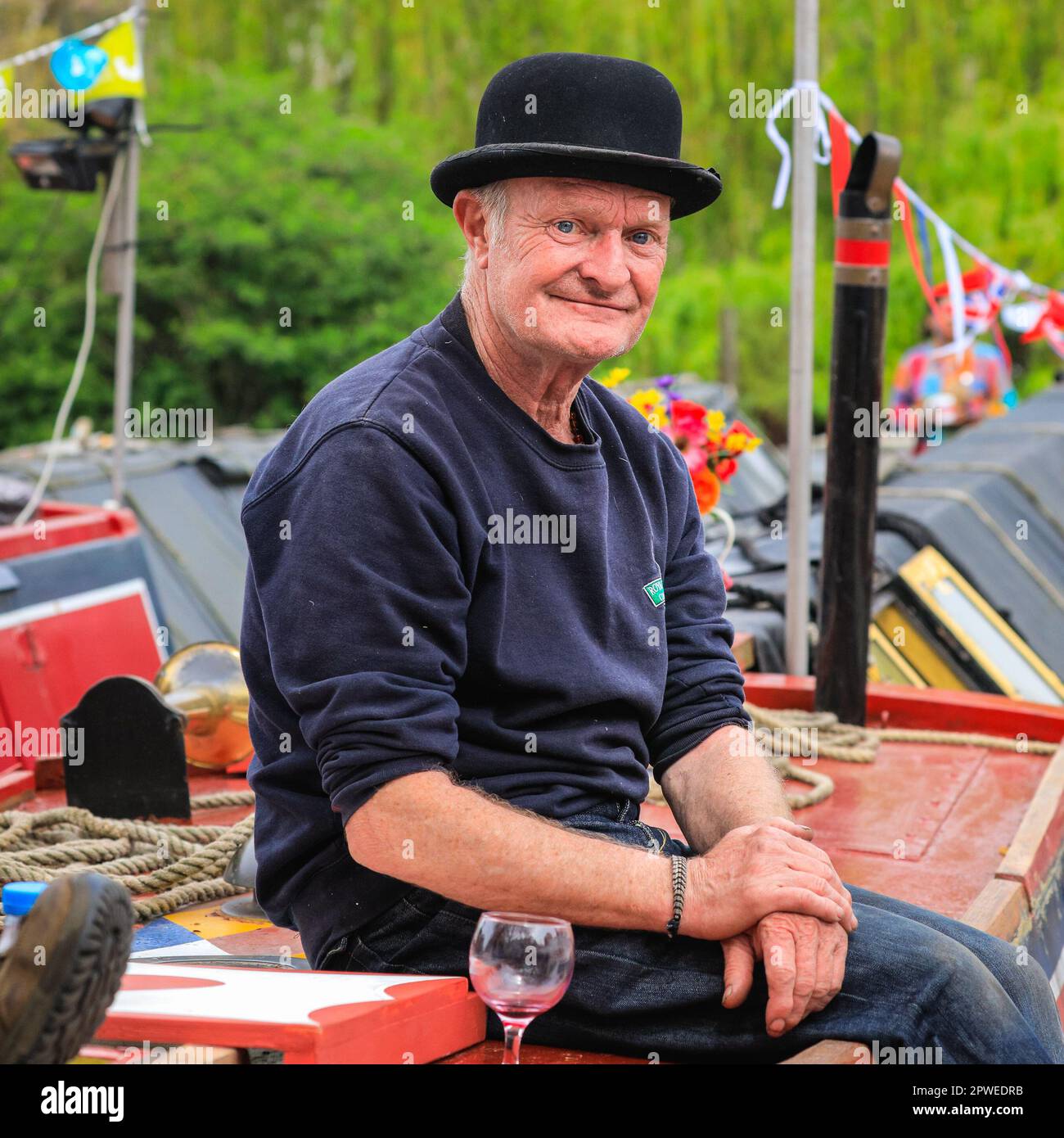 London, UK. 30th Apr, 2023. Dave sits on his narrowboat donning a ...