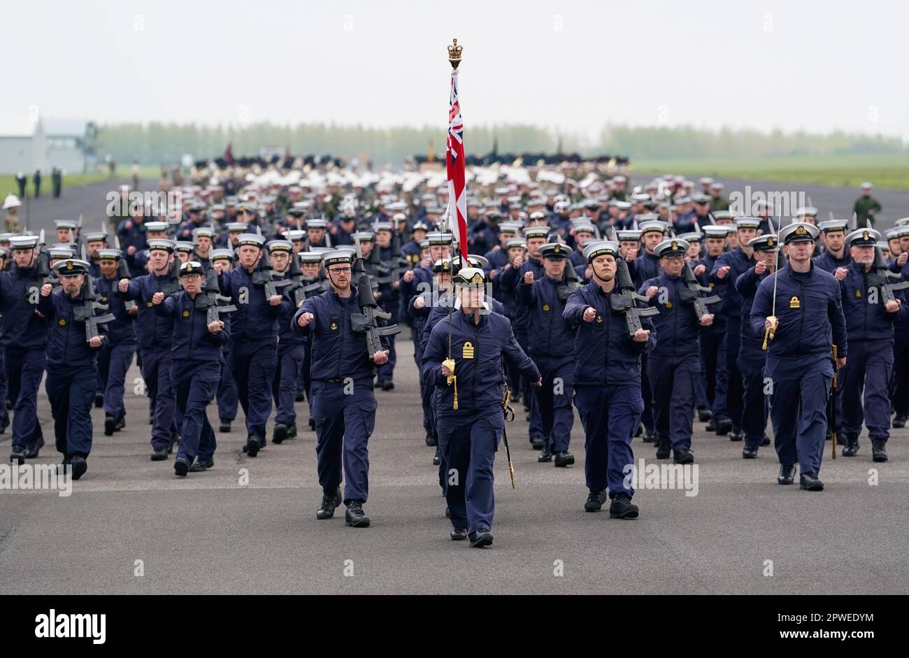 Members of the Royal Navy march during a full tri-service and ...