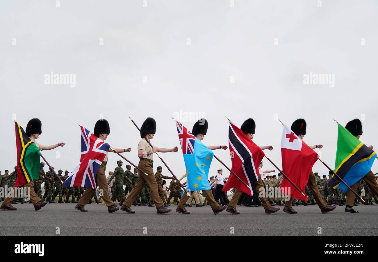 Guards carry flags from Commonwealth countries during a full tri ...