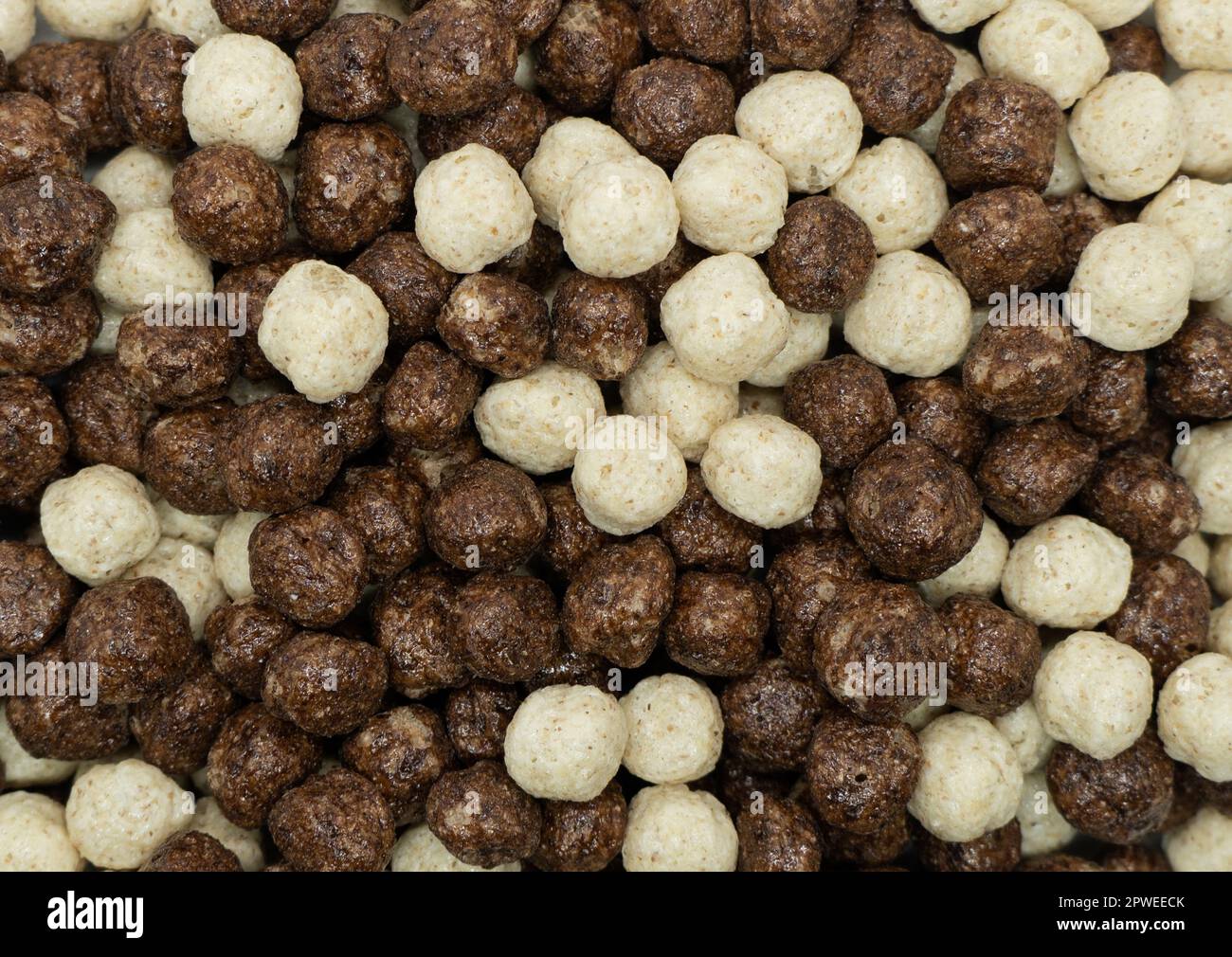 Chocolate corn flakes teture background. Chocolate puff cereal ...