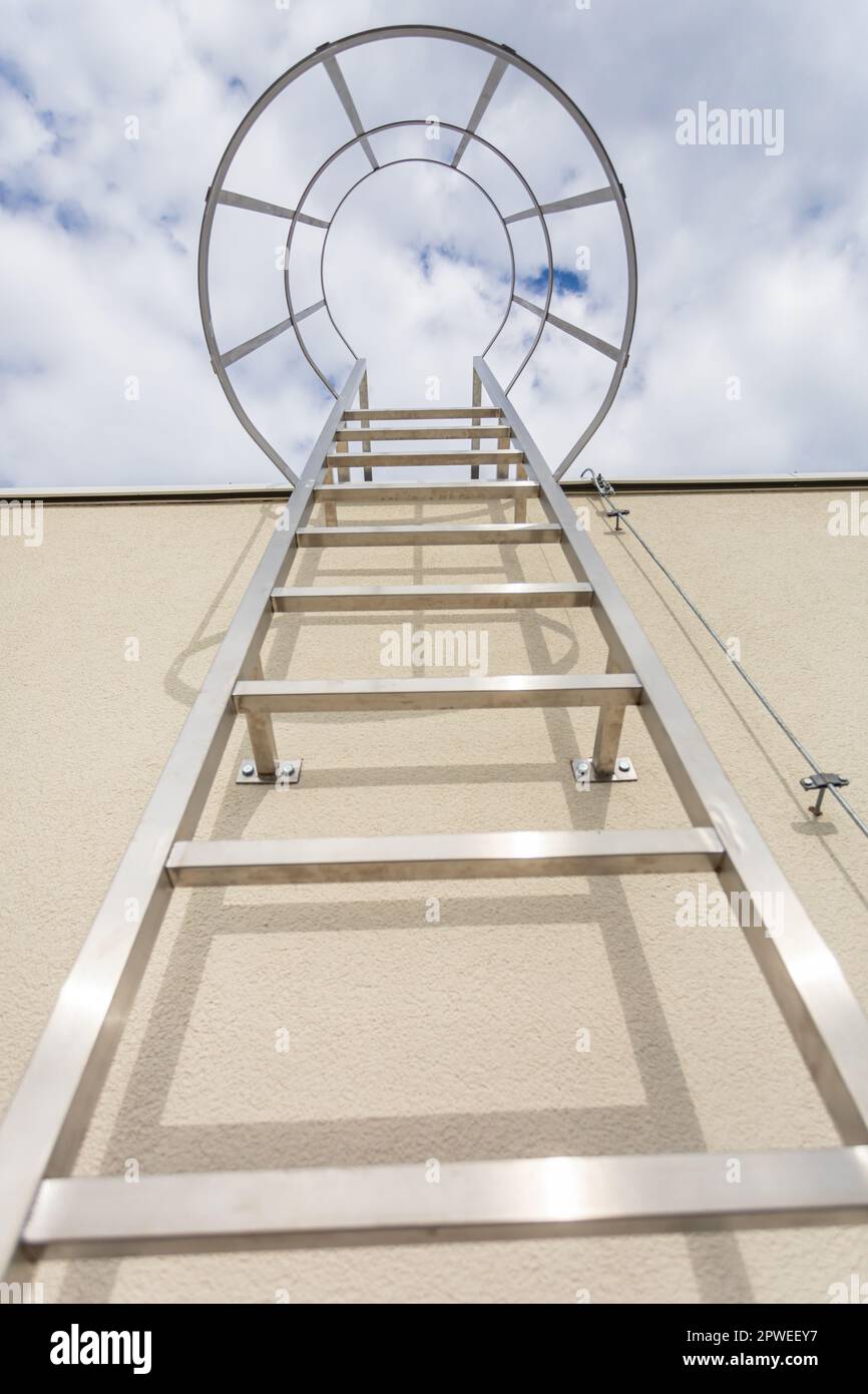 View from below of the technical ladder leading to the building's roof ...