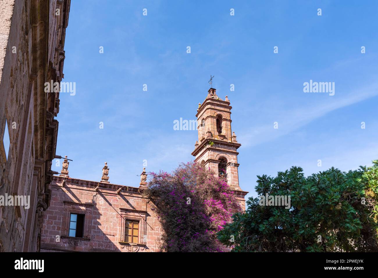 facade and bell tower at corner of landmark clavijero cultural center ...