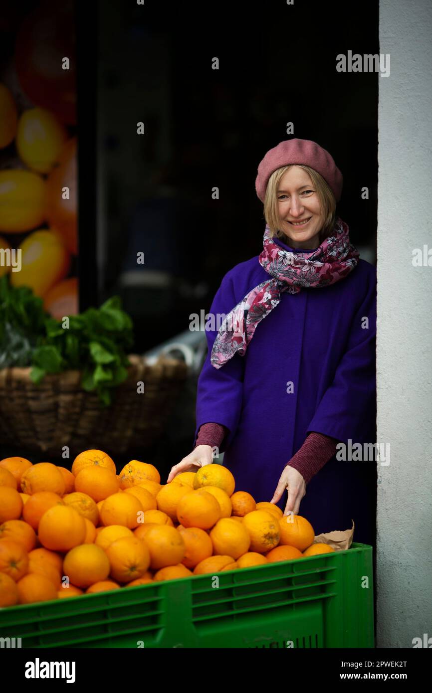 Happy local grocery store woman hi-res stock photography and images - Alamy
