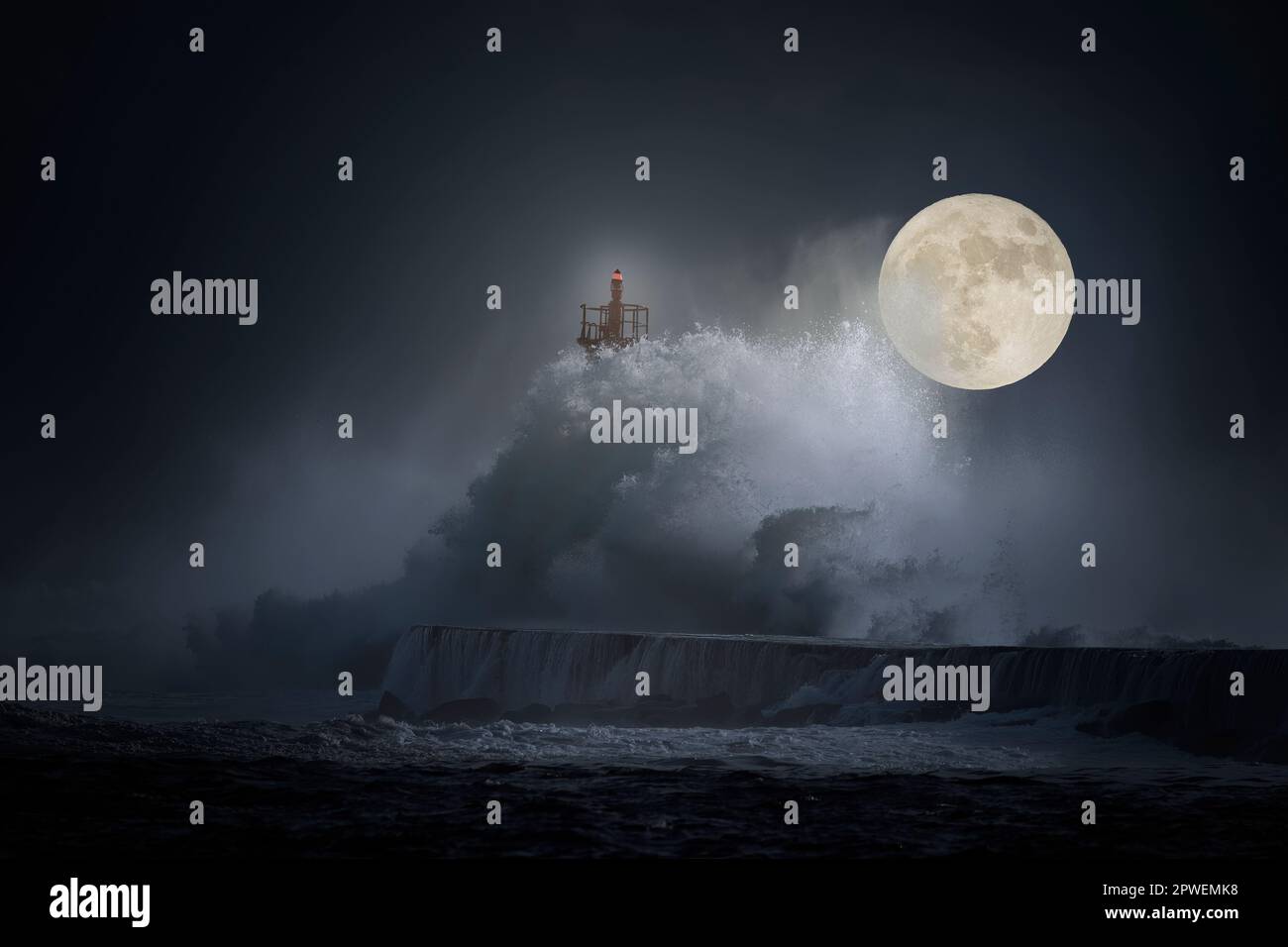 Stormy wave splash in a full moon night Stock Photo - Alamy