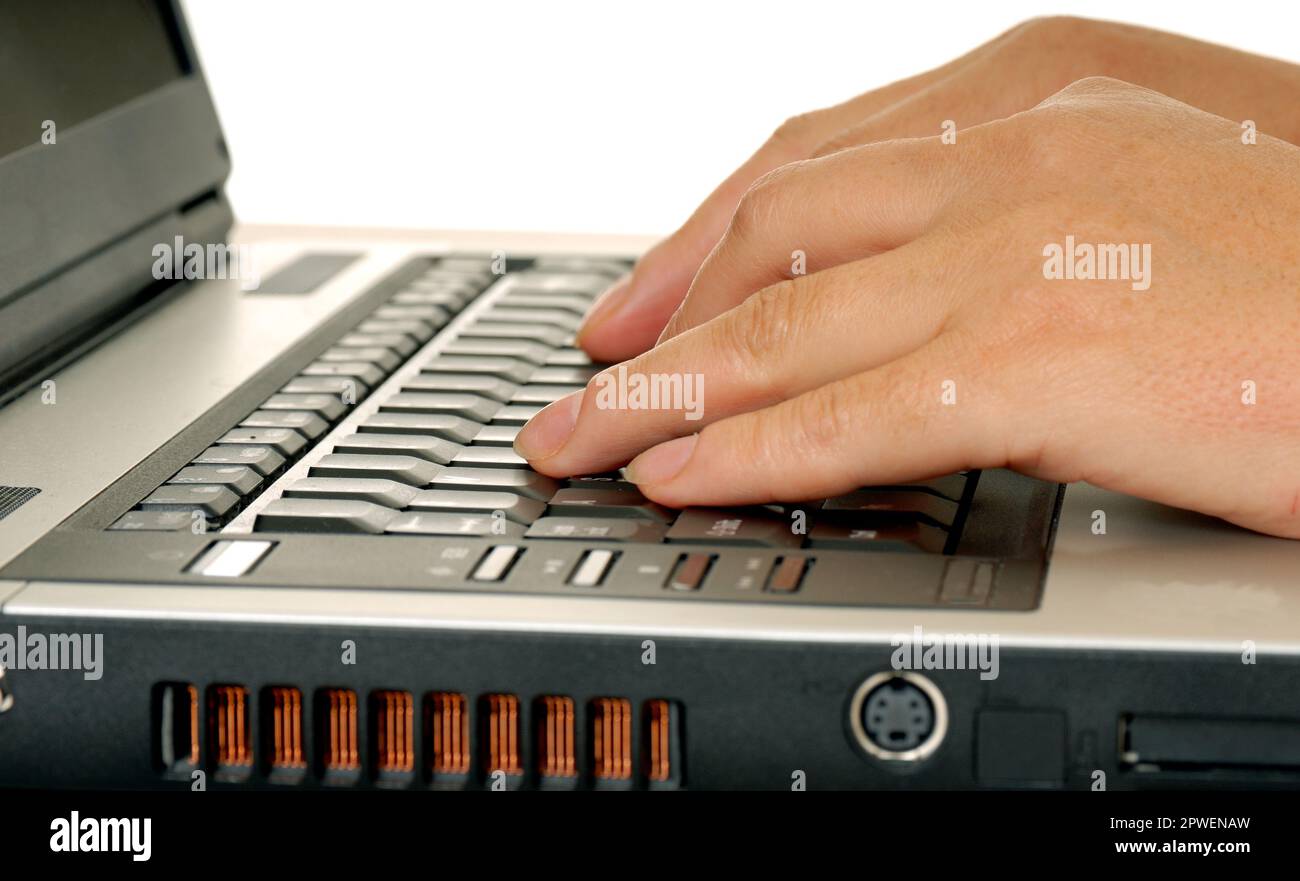 Fingers typing on a computer keyboard isolated Stock Photo - Alamy