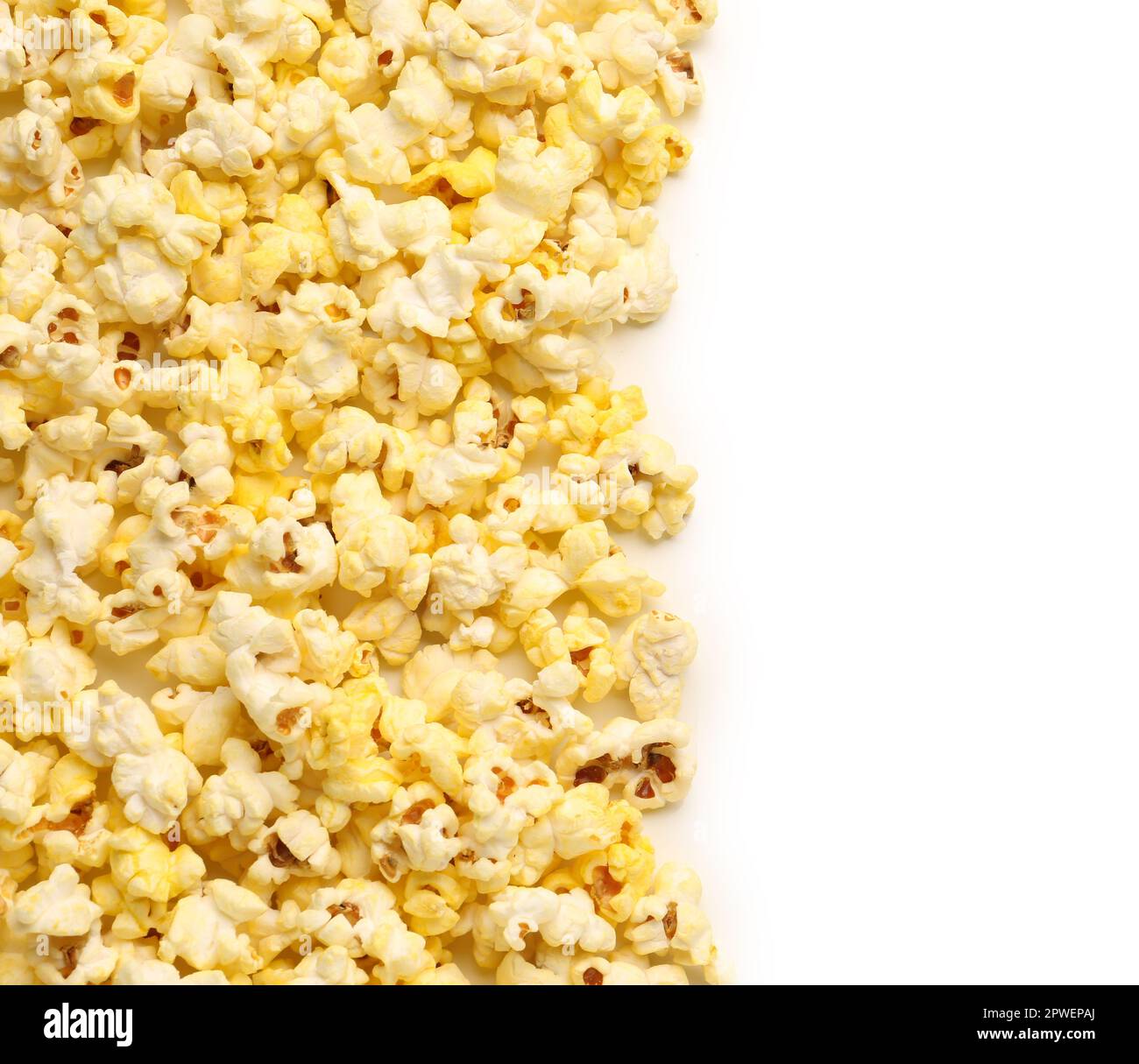 Crispy popcorn on white background, closeup Stock Photo - Alamy