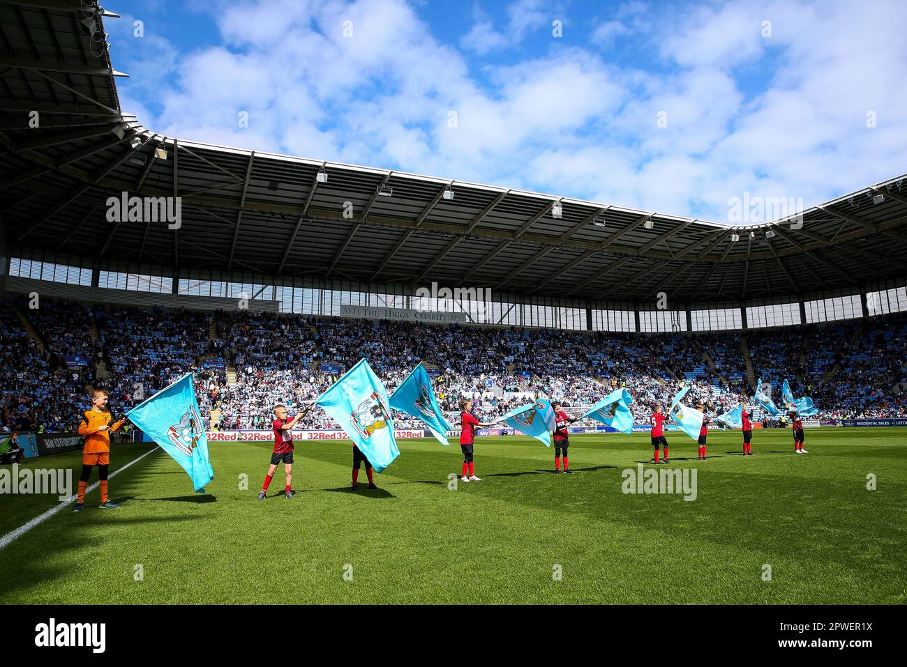 Coventry City flag bearers on the pitch ahead of the Sky Bet ...