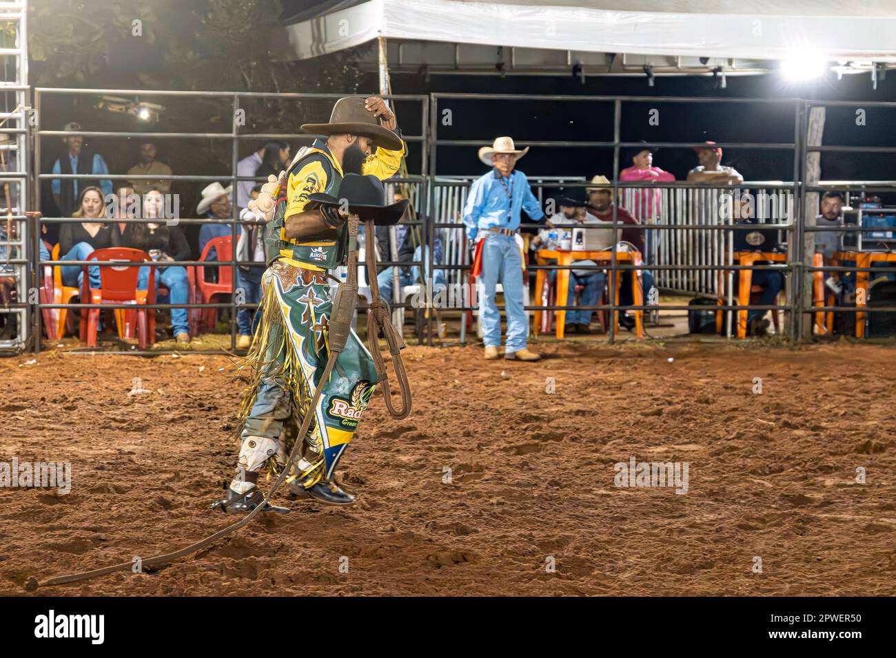 Itaja, Goias, Brazil - 04 22 2023: rodeo rider standing in the arena ...