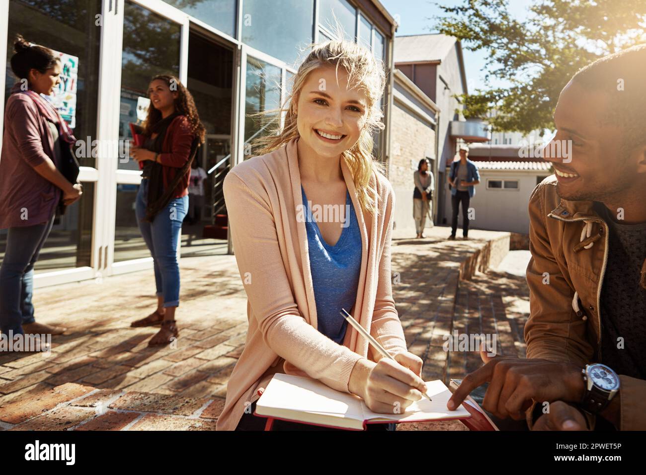 Diverse female students outdoor studying hi-res stock photography and ...