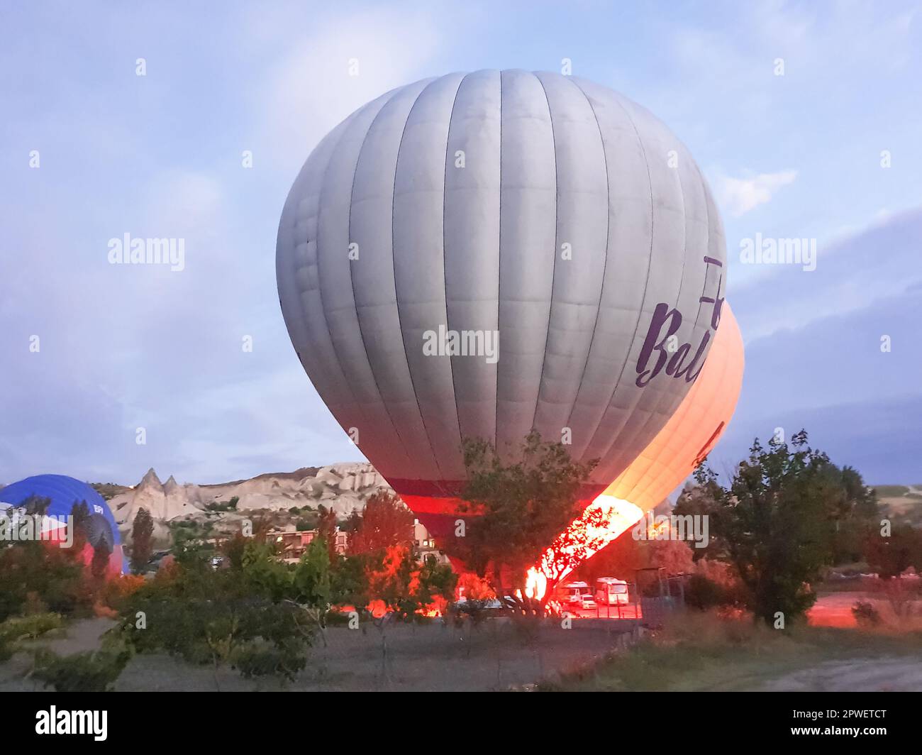 Process of launching many colored beautiful balloons into air in ...