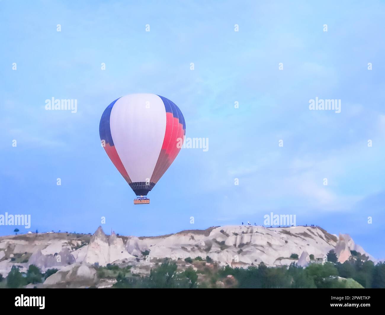 Process of launching many colored beautiful balloons into air in ...