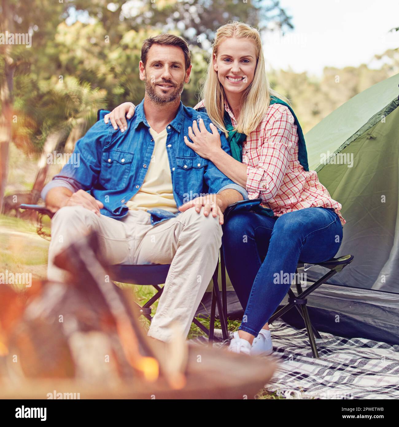 We love the great outdoors. Portrait of an affectionate couple camping ...