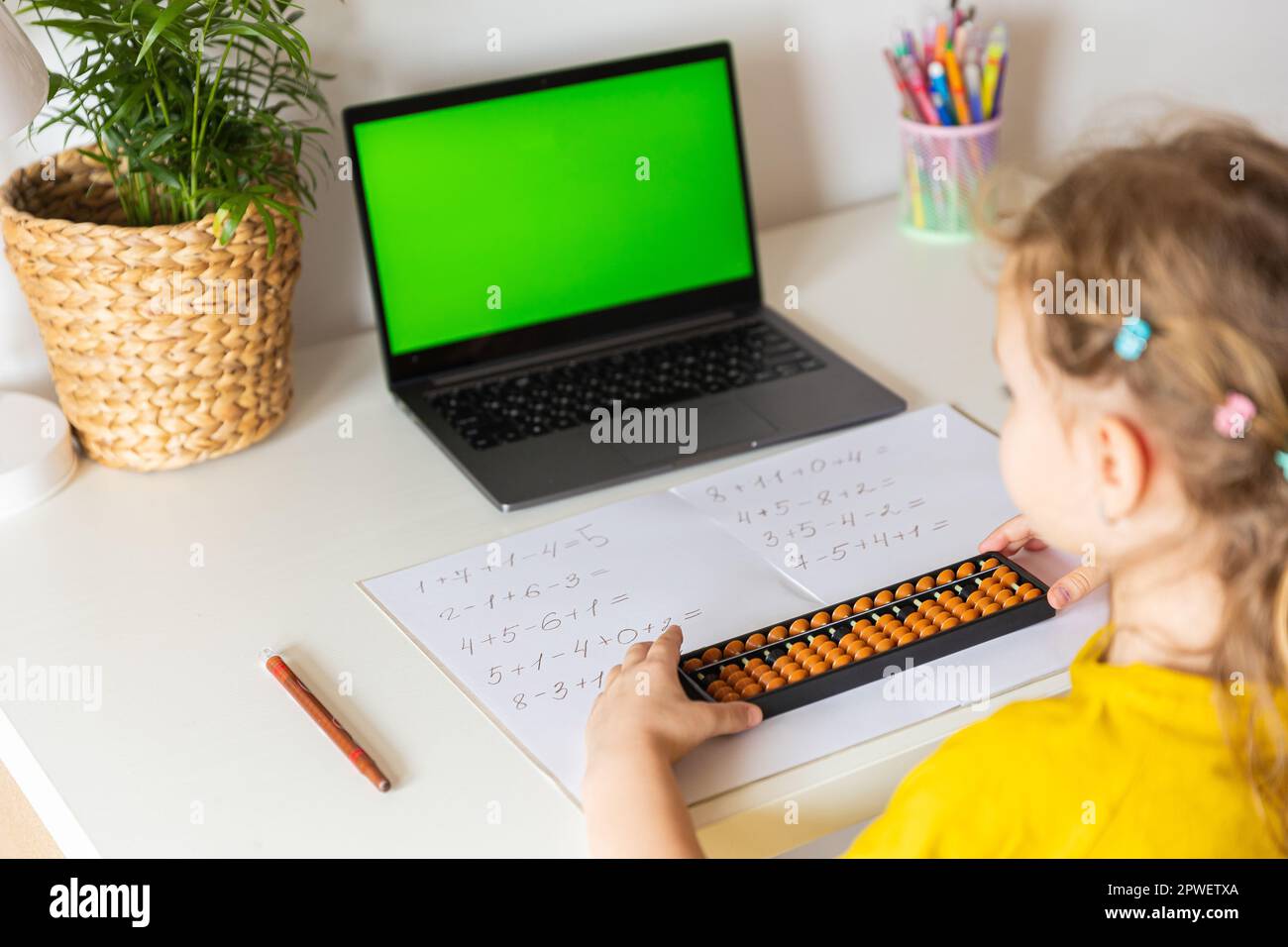 School kids on laptop in class hi-res stock photography and images - Alamy
