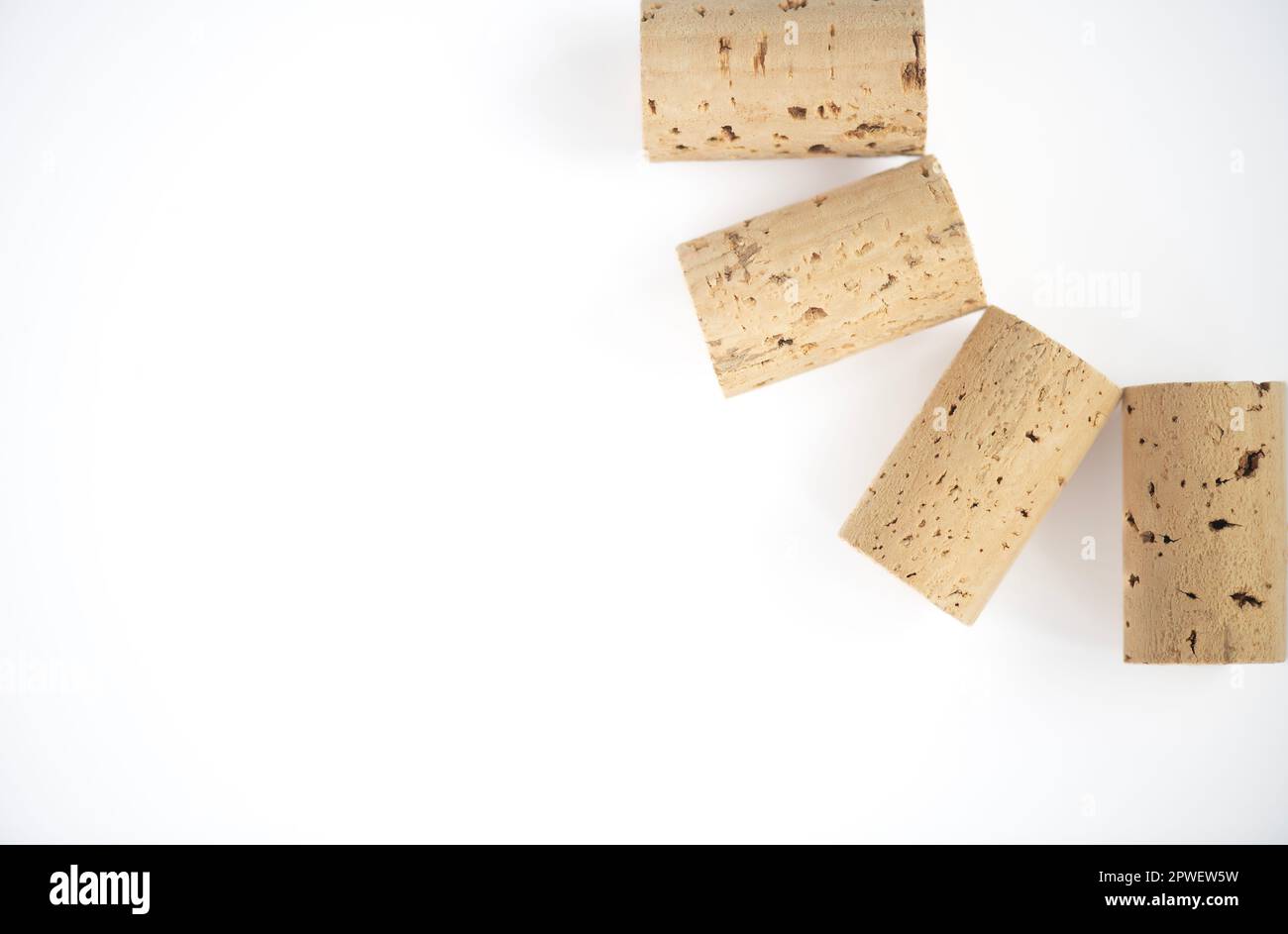 Bottle corks in corner isolated on a white background Stock Photo - Alamy