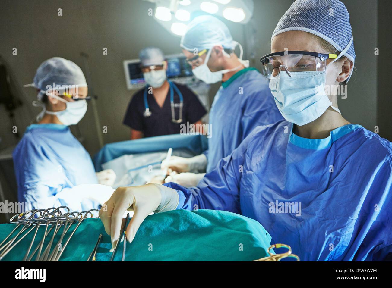 Expert hands operating on their patient. surgeons in an operating room Stock Photo - Alamy