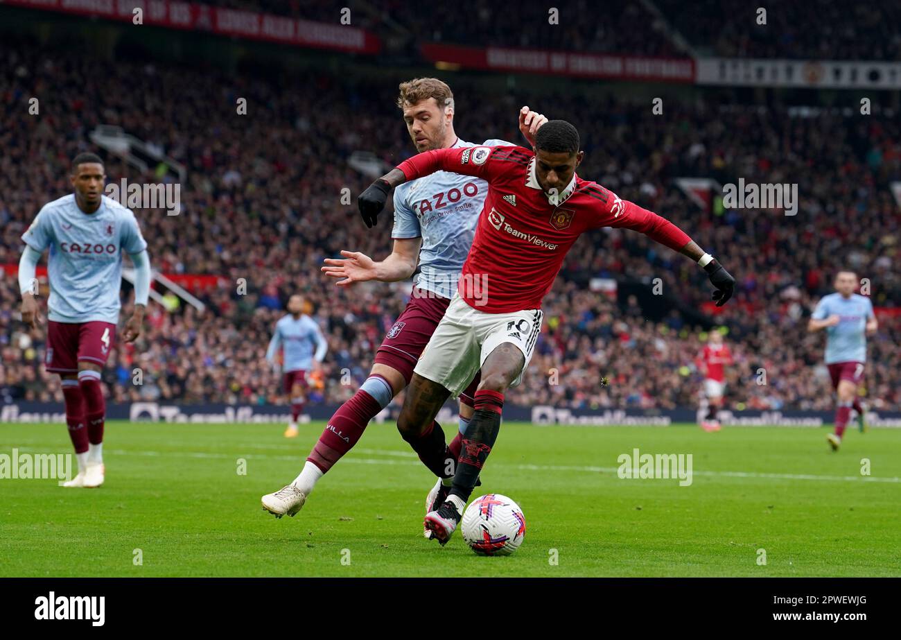 Aston Villa's Calum Chambers battles for the ball with Manchester ...