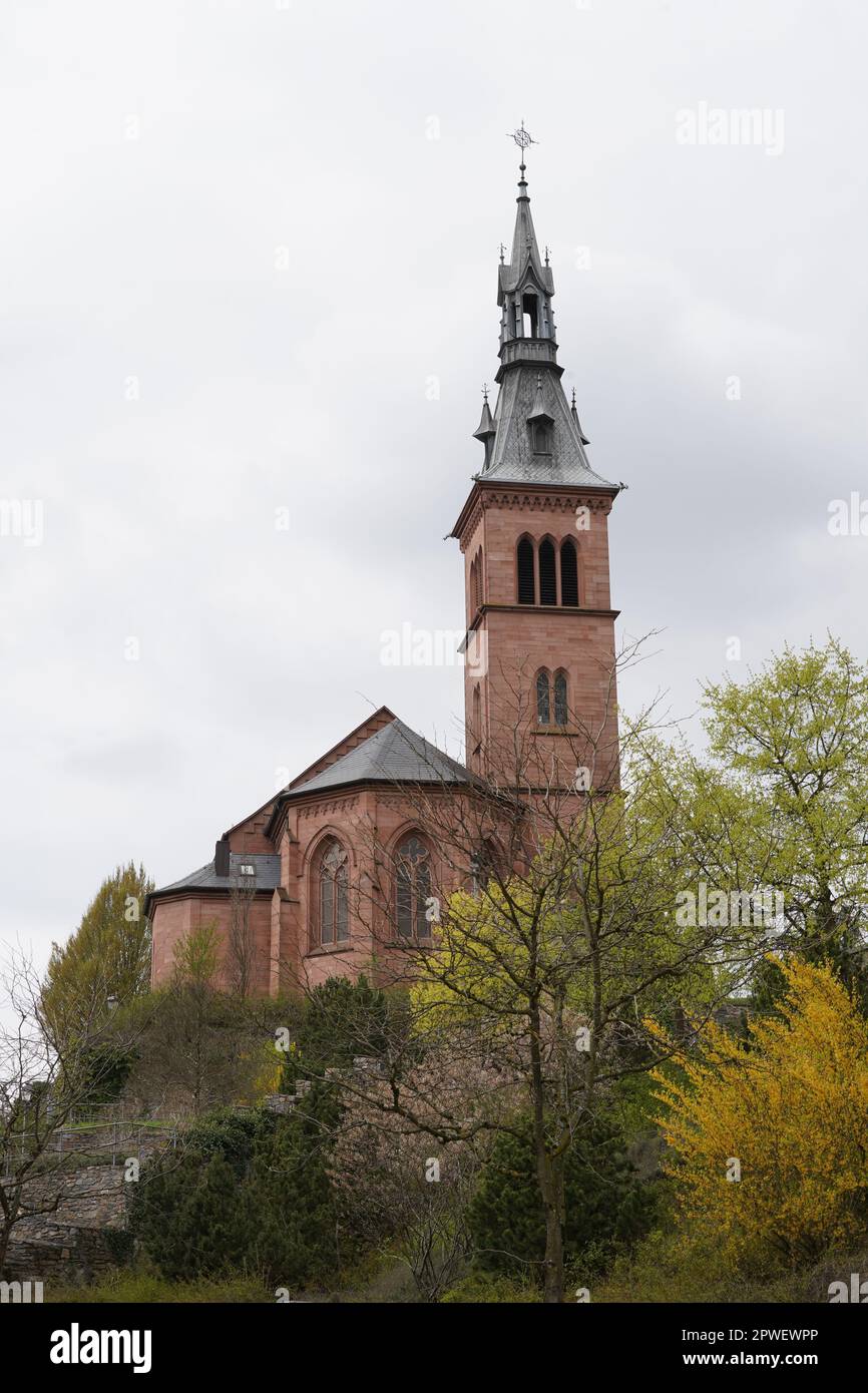 Catholic Church of Holy Spirit in low angle view. On background is blue ...