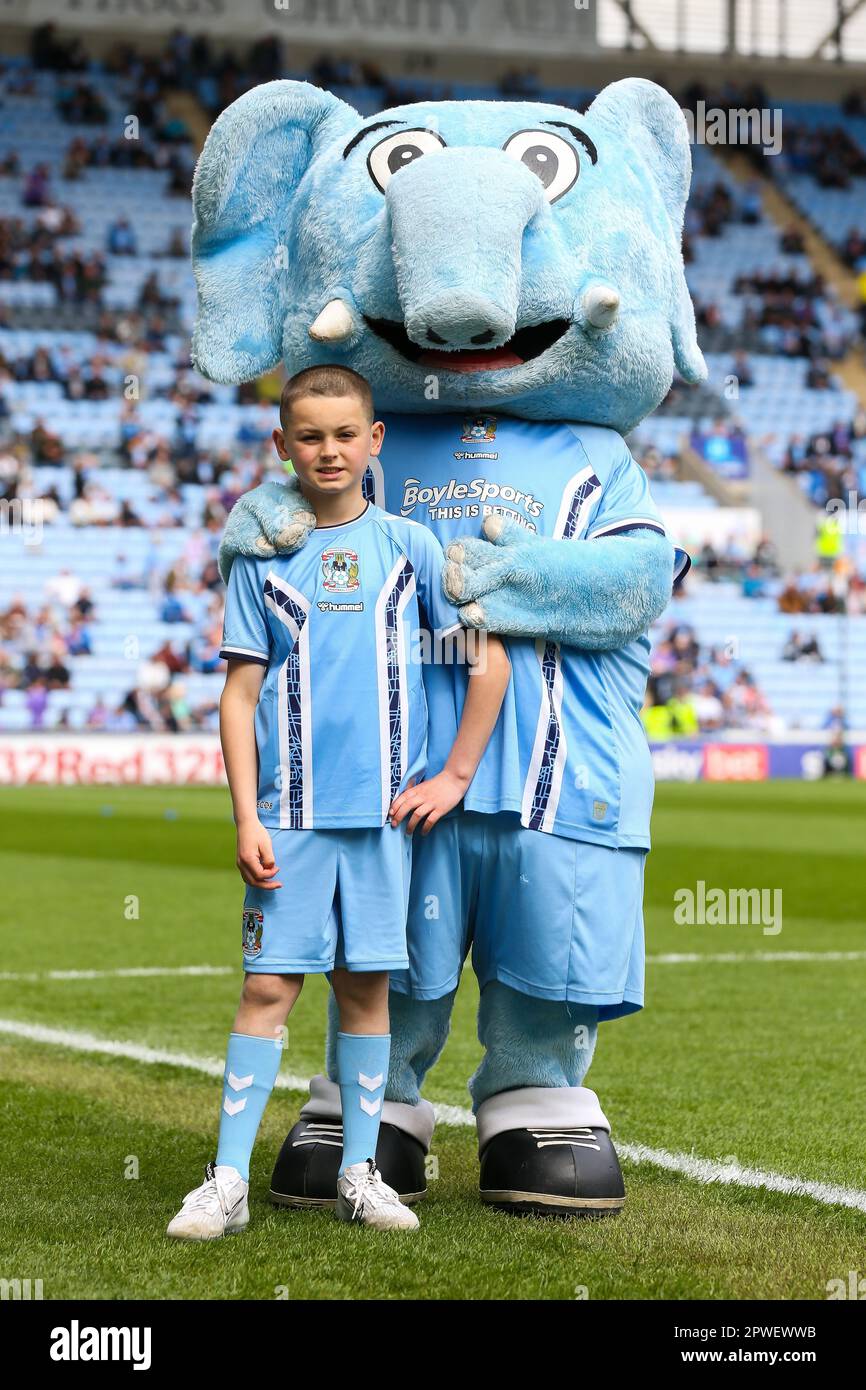 Coventry City's Sky Blue Sam poses for a photo with a match day mascot ...