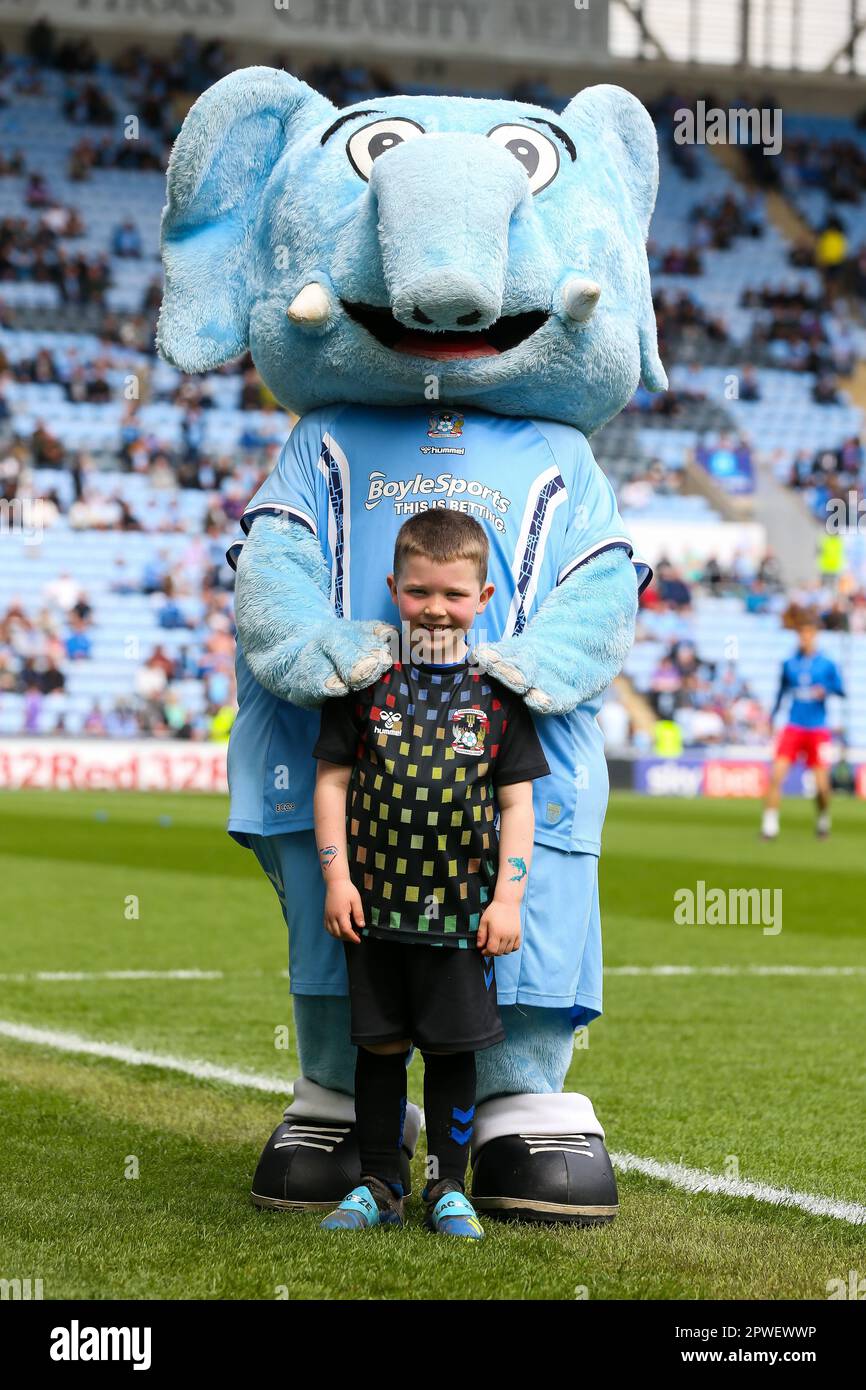 Coventry City's Sky Blue Sam poses for a photo with a match day mascot ...