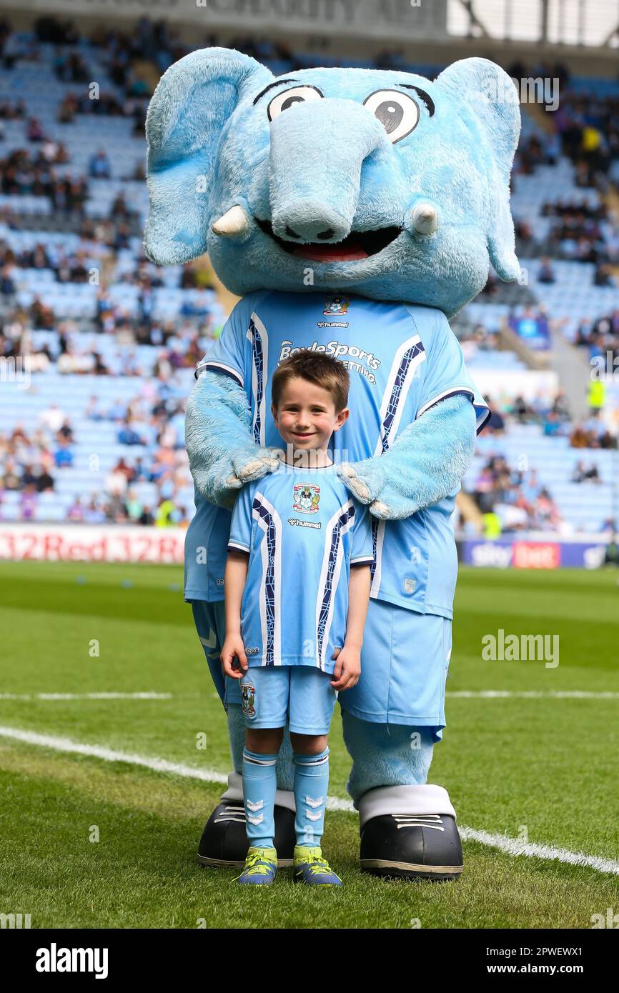 Coventry City's Sky Blue Sam poses for a photo with a match day mascot ...