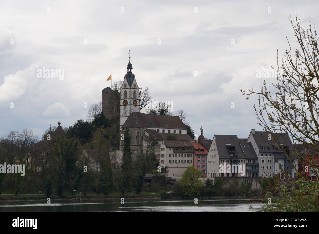 Catholic Church of St. John Baptist with Rhine river on the foreground ...