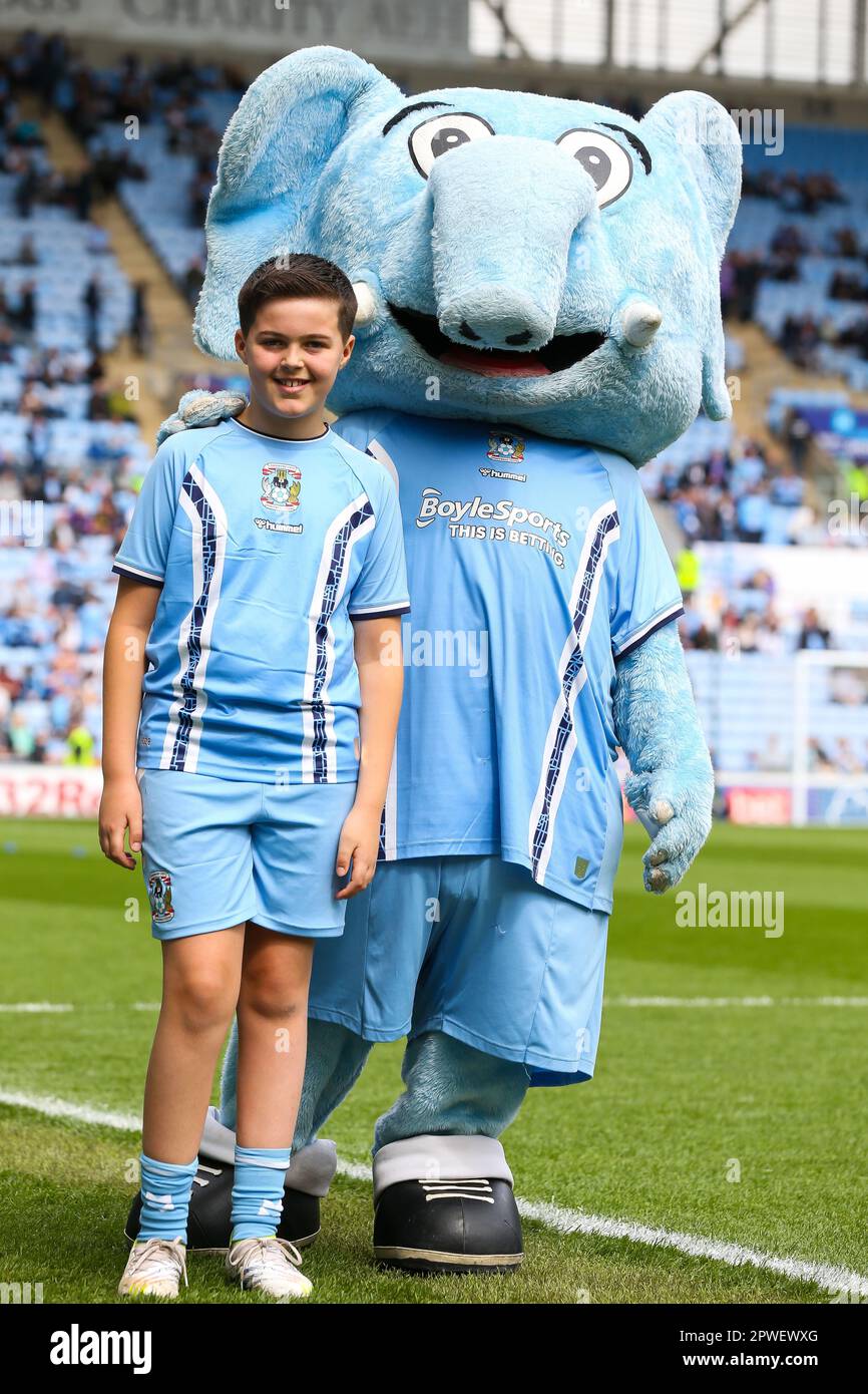 Coventry City's Sky Blue Sam poses for a photo with a match day mascot ...