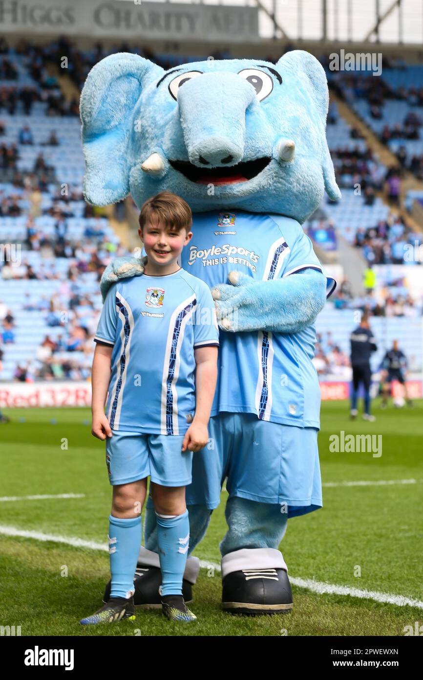Coventry City's Sky Blue Sam poses for a photo with a match day mascot ...