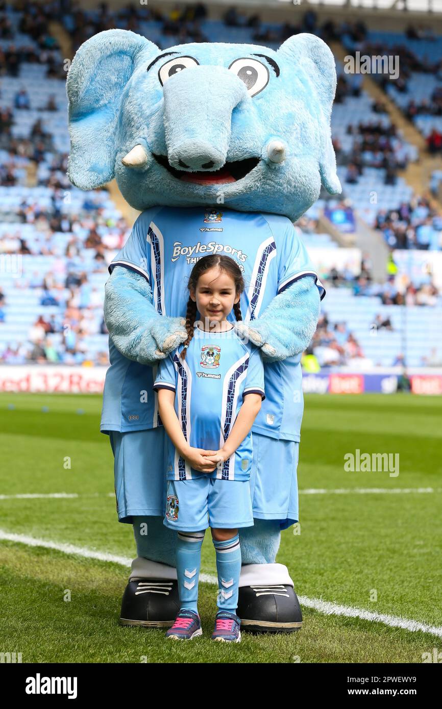 Coventry City's Sky Blue Sam poses for a photo with a match day mascot ...