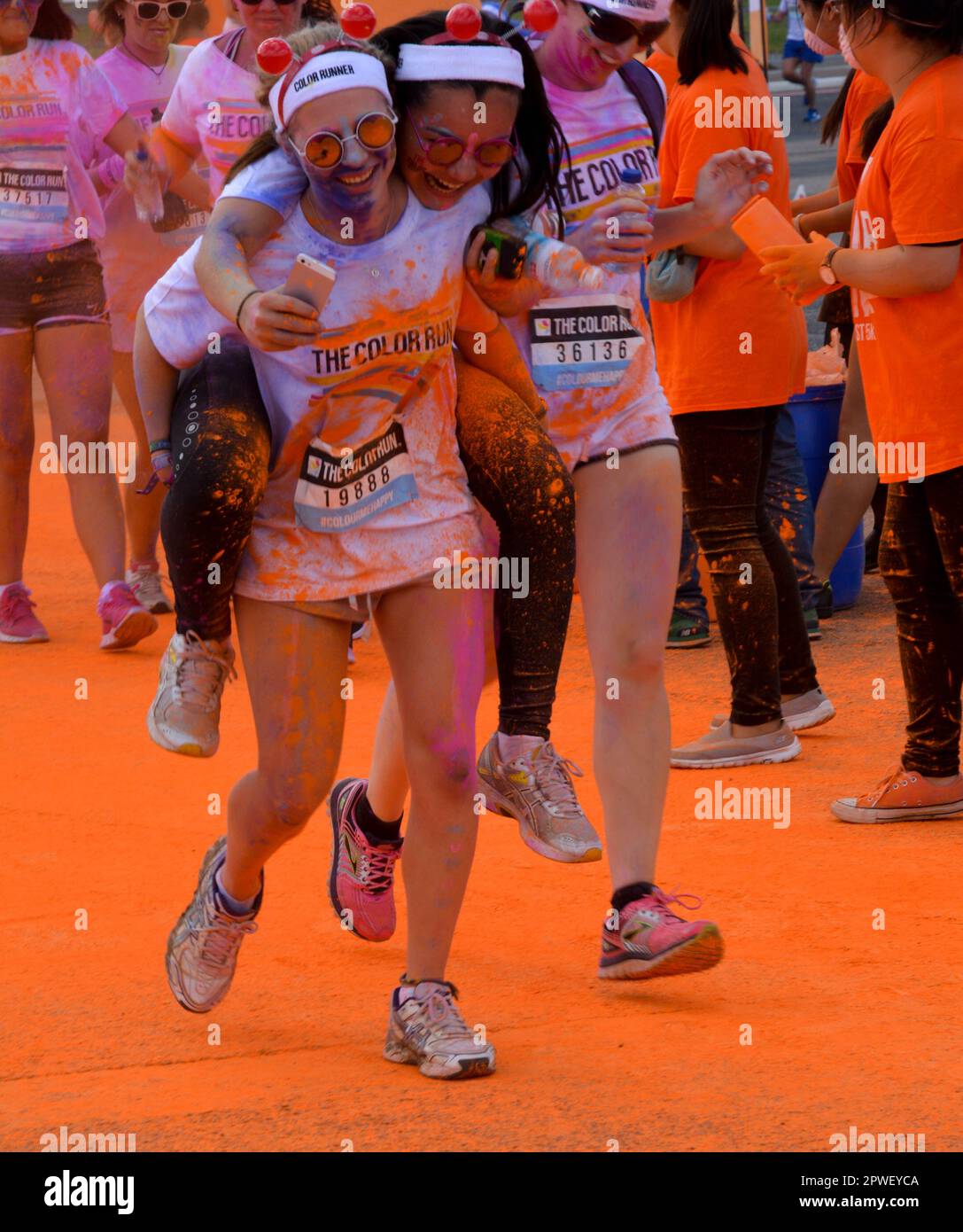 Participants at The Color Run hosted in Birmingham, UK Stock Photo - Alamy