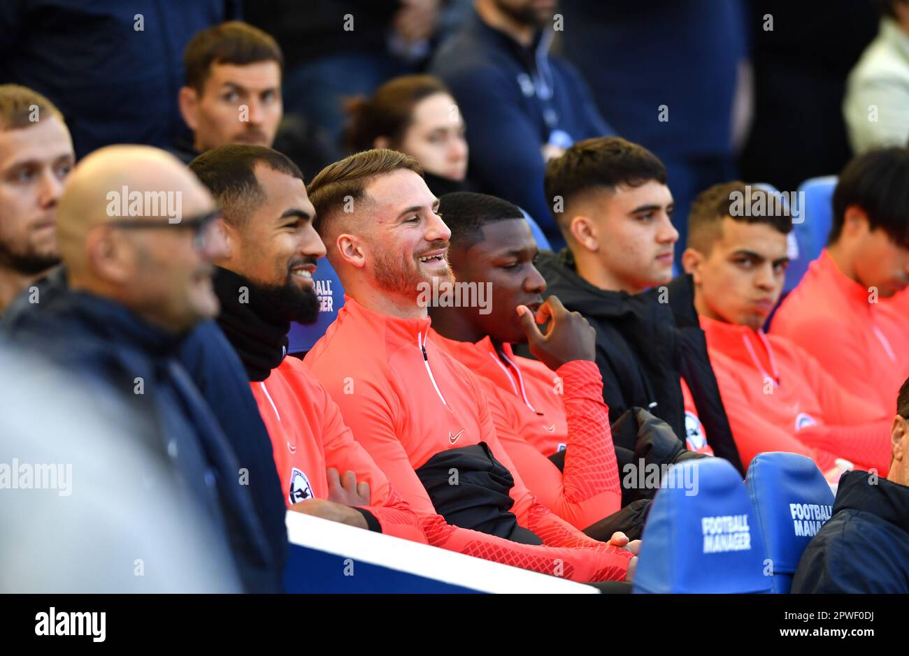 Alexis Mac Allister of Brighton looks happy on the subs bench during ...