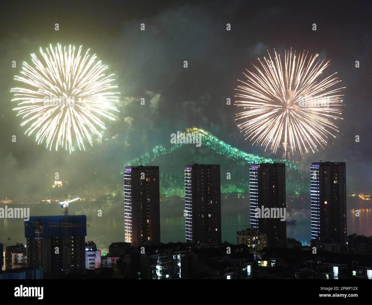 YICHANG, CHINA - APRIL 30, 2023 - Fireworks display celebrates the May ...