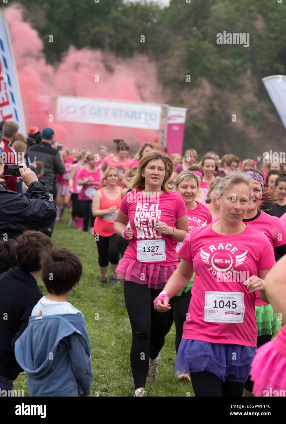 Race for Life Runners taking part to raise money for charity wearing ...